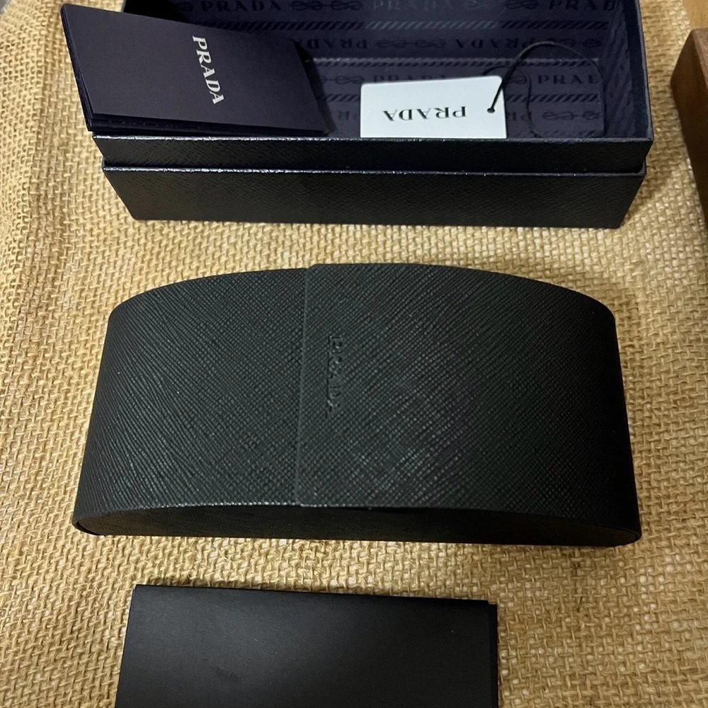 Prada | Accessories | Prada Black Oval Logo Sunglasses | Poshmark